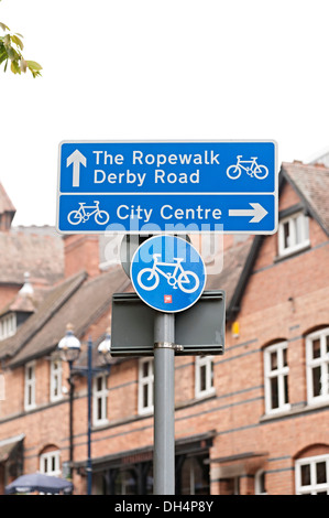 Road signs, a large metal, round stop sign at the junction of roads in ...