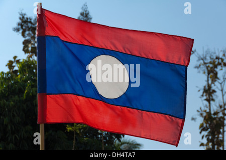 Lao National Flag with red flag with communist symbols of a sickle with ...