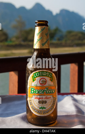 A bottle and glass of Beerlao lager by Lao brewery Company, Vientiane ...