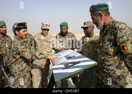 U.S. Army field artillery advisers with 1st Battalion, 76th Field ...