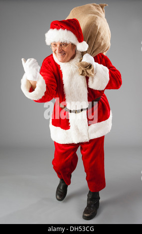 Santa and his sack Stock Photo - Alamy