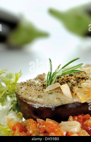 Fish stuffed eggplant Stock Photo - Alamy