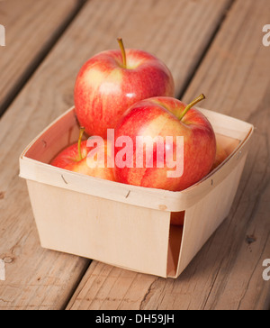 Small ripe yellow apples with red sideways located on a white ...