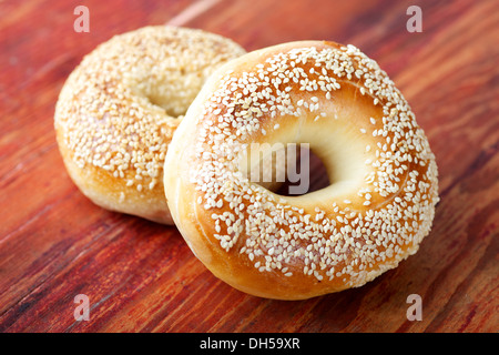 two bagels on the wooden surface Stock Photo - Alamy