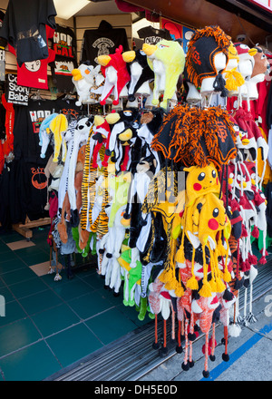 Various character trapper hats on display Stock Photo - Alamy