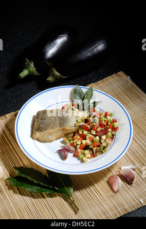 Steamed cod fish with vegetables Stock Photo - Alamy