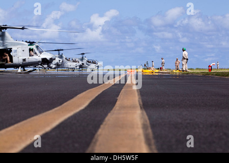 U.S. Marines with Marine Wing Support Squadron (MWSS) 271 shoot during ...