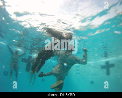 A Marine Corps Instructor of Water Survival assigned to the 2nd Marine ...