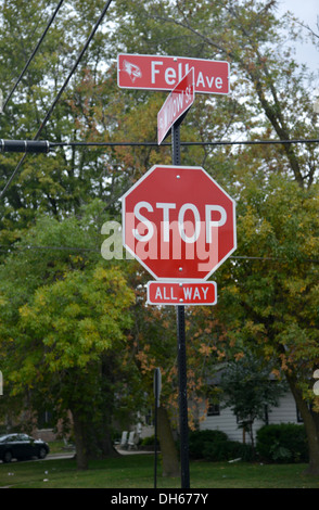 4 way Four way stop sign at intersection, residential neighborhood ...