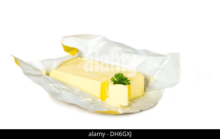 Yellow butter with paper package placed on isolated background Stock ...