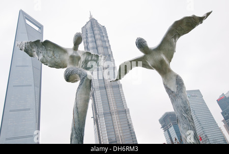China Shanghai statue of angel in front of lake Stock Photo - Alamy