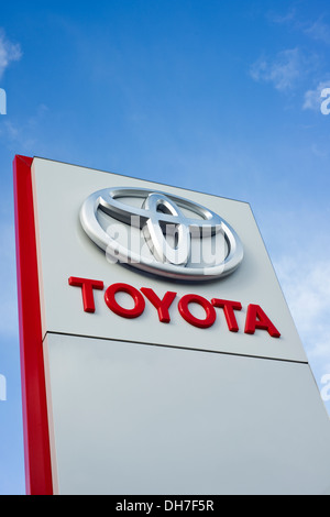 Toyota logo outside a car showroom Stock Photo - Alamy