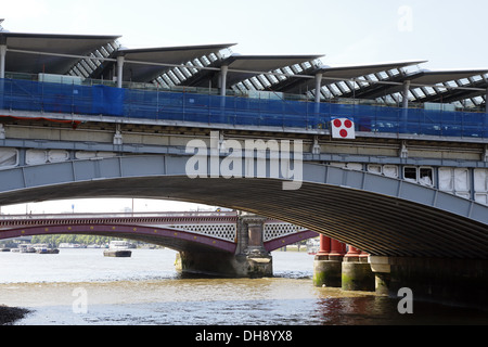 Blackfriars Bridge at night. The solar panels across the whole station ...