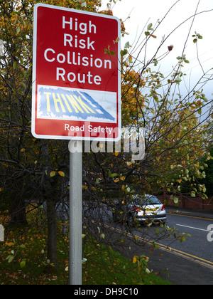 High risk of collision. A road sign with an exclamation point and two ...