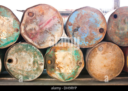 stack of old fuel tanks background Stock Photo - Alamy