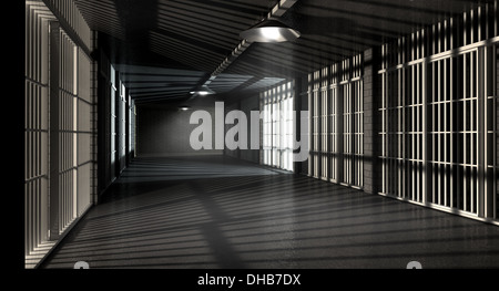 A corridor in a prison at night showing jail cells illuminated by ...