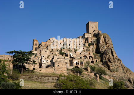 The abandoned hilltop town of Craco in Basilicata, southern Italy, with ...