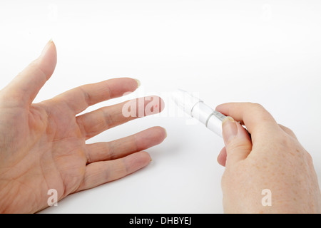 Blood sugar finger stick test with glucometer and diabetic supplies ...