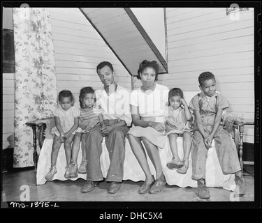 Mr. and Mrs. James Robert Howard and their four children live in a ...