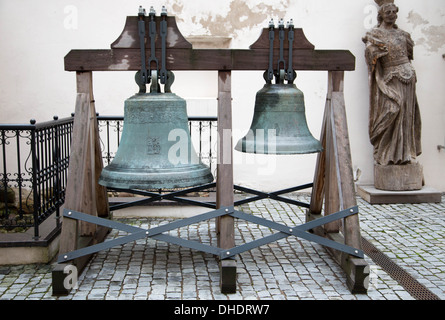 Traditional large old bells hanging in an english church tower from the ...