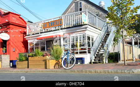 Street scene of Provincetown Cape Cod with tour trolley bus Stock Photo ...