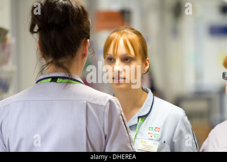 Nurses in discussion on an NHS hospital ward UK Stock Photo - Alamy