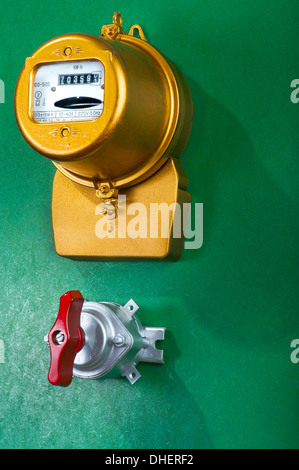 Golden retro electric meter with toggle switch Stock Photo - Alamy