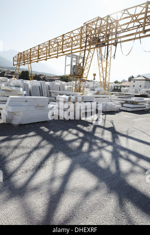stack of white marble slabs on construction site for the decoration of ...