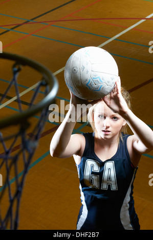 Sports, netball and portrait of active woman on court ready for ...