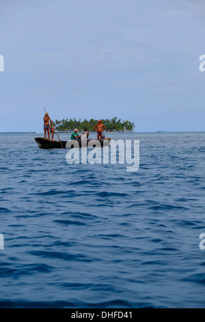Men from the Guna people boating in a Cayuko hand-built dugout canoe in ...