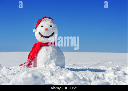 snowman on blue sky background Stock Photo - Alamy