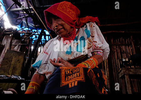 An indigenous Guna woman cooking in her kitchen in Carti Sugtupu island ...