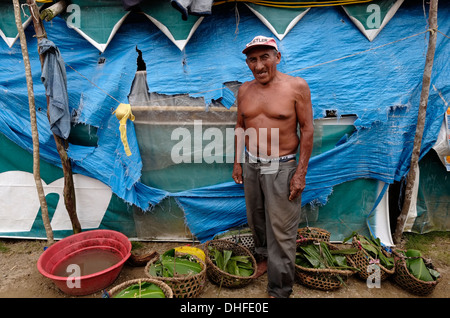 A man from the Guna people selling banana leaves in the Island of ...