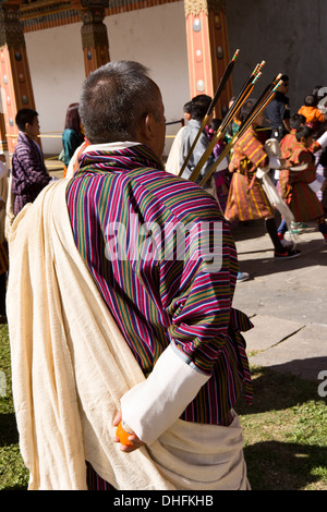 A Bhutanese man wearing traditional Kabney silk scarf worn as a part of ...