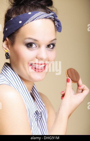 Cute funny girl with chocolate on white background Stock Photo - Alamy