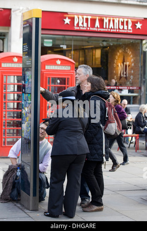 tourist getting help with directions in Monaco Stock Photo - Alamy