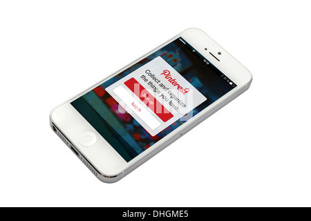 Pinterest display on iPhone 5 screen in hand Stock Photo - Alamy