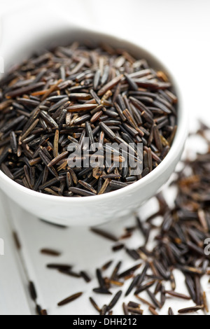 wild rice in a white ceramic bowl Stock Photo - Alamy