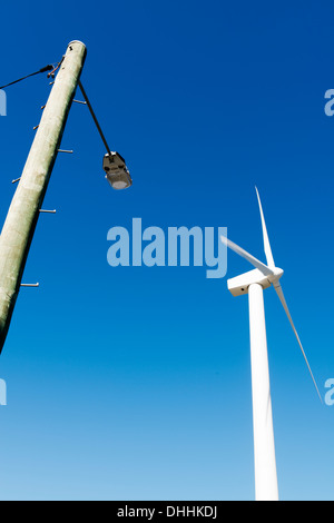 Wind turbine with electrical power pole and light Stock Photo - Alamy
