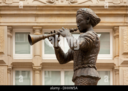 Pied Piper of Hamelin statue on fountain in town of Hamelin Germany ...