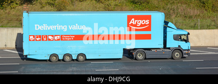 M25 motorway Argos lorry truck towing trailer Stock Photo - Alamy