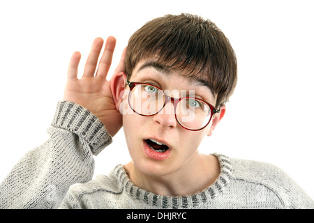 Portrait of young casual man which overhears conversation over pink ...