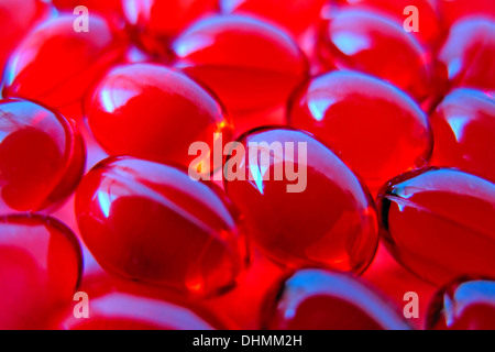red gel pills close up Stock Photo - Alamy