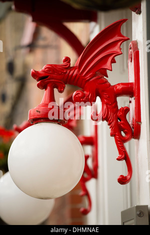 Welsh dragon in cast iron bench at Beddgelert railway station ...
