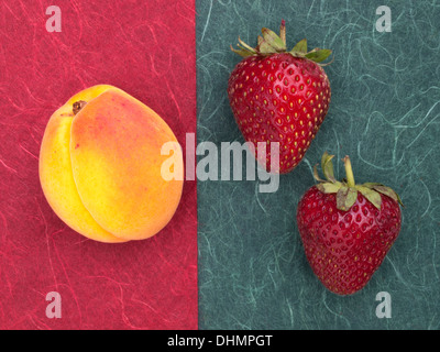 Fruit on contrasting coloured backgrounds Stock Photo - Alamy