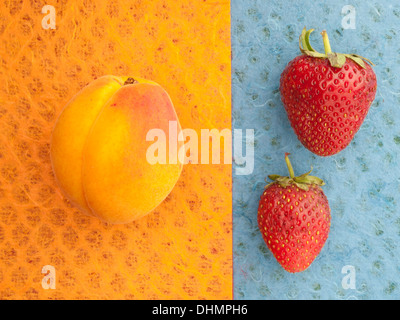Fruit on contrasting coloured backgrounds Stock Photo - Alamy