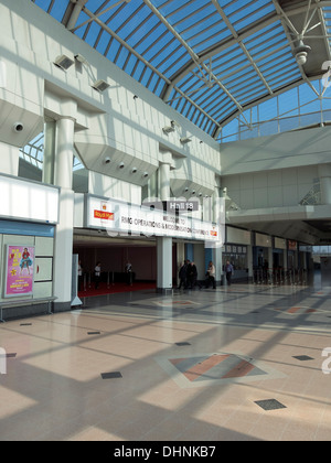 Interior of Birmingham NEC exhibition hall with crowds of people ...
