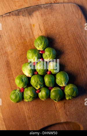 Delicious Christmas tree shape vegetable salad with decoration Stock ...