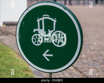 Traffic Sign Warning of Horse & Carriage Drivers on a busy street in ...