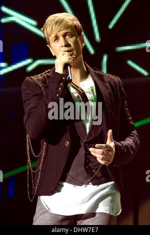 Kian Egan of Westlife performs live on stage at the SECC during their ...